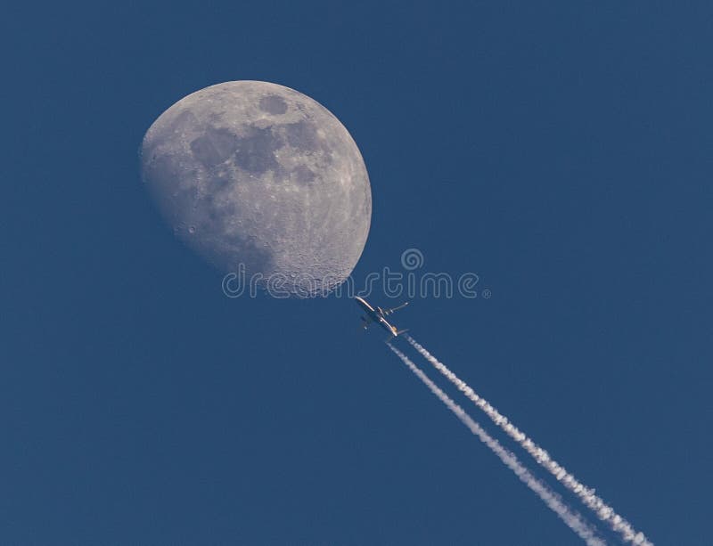 Jet flying over moon stock image. Image of aeroplane - 268972909