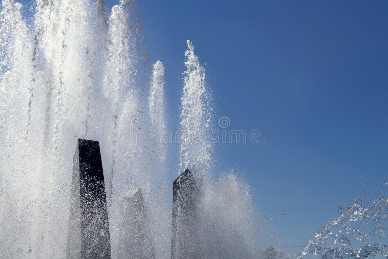 Jet Fountain Against the Blue Sky Water Jet from a Vertical Fountain ...