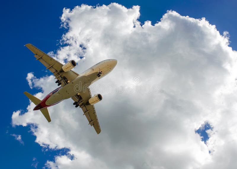 A Jet Passenger Plane in a Blue Sky Editorial Stock Photo - Image of ...