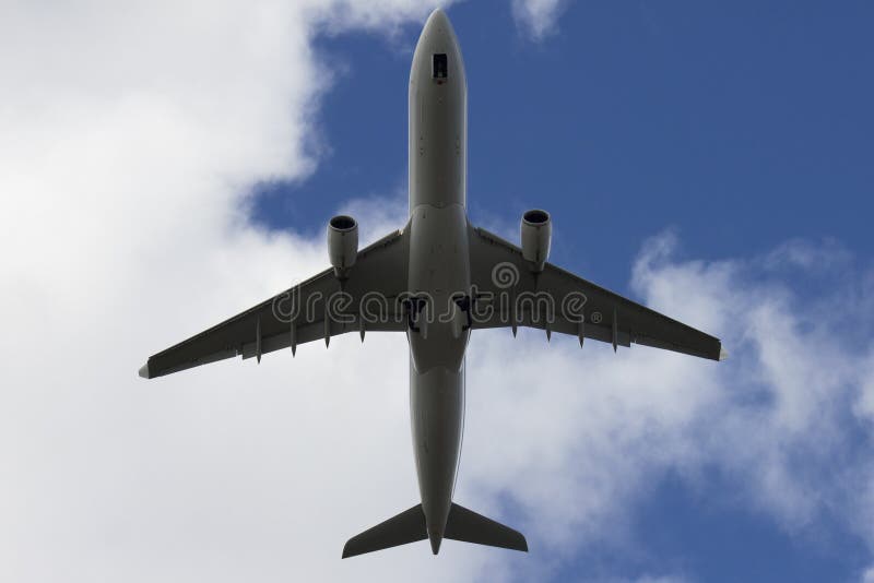A jet plane flying over stock photo. Image of airplane - 28434466