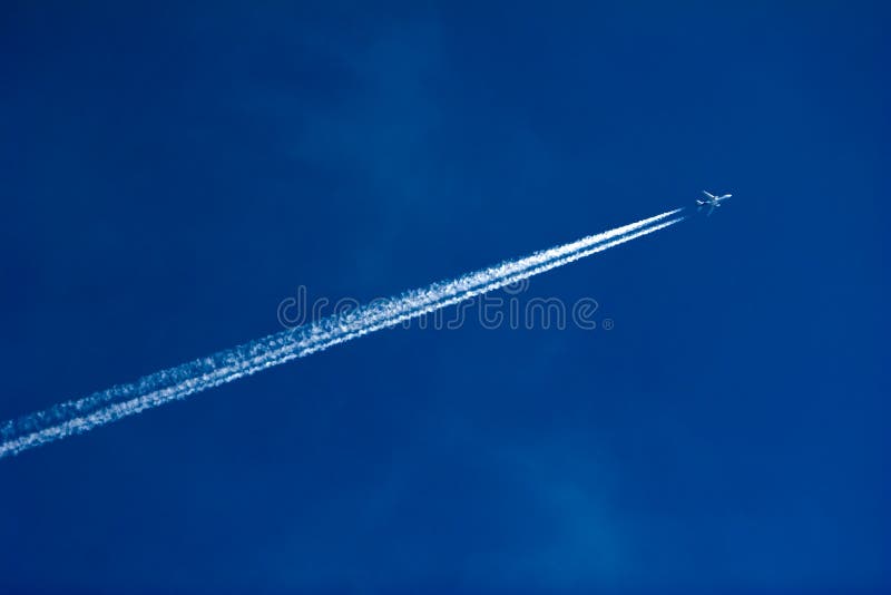 Jet plane in the sky stock photo. Image of silhouette - 2105470