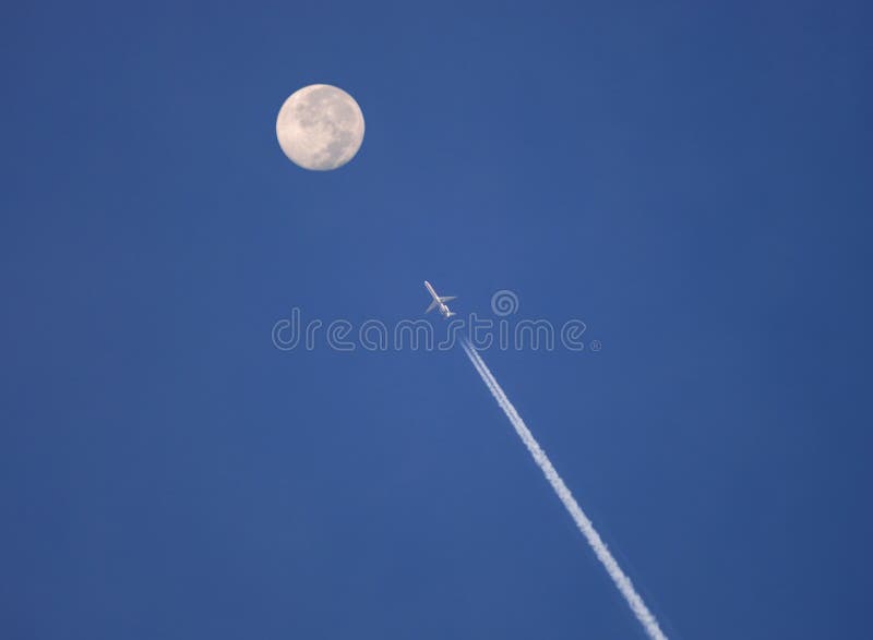 Jet plane to the moon stock image. Image of high, blue - 4875895