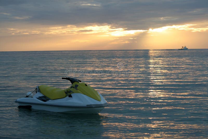 Jet ski stock image. Image of sunset, boat, surf, luxury - 1714041