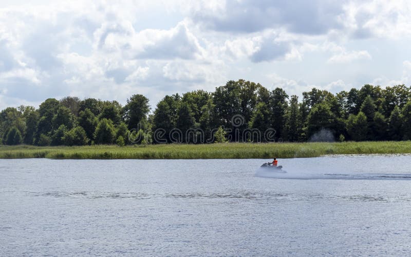 Jet Ski Adventure. Man on Jet Ski on Lake Stock Photo - Image of ...