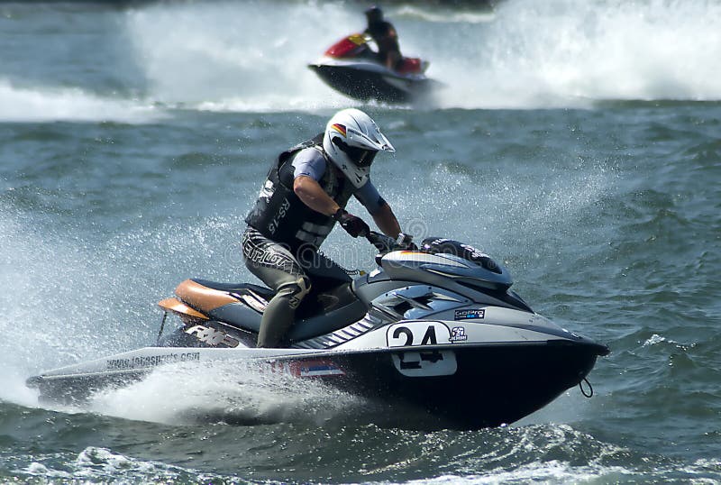 Jumping man on jet ski stock photo. Image of fast, jetski - 10023994