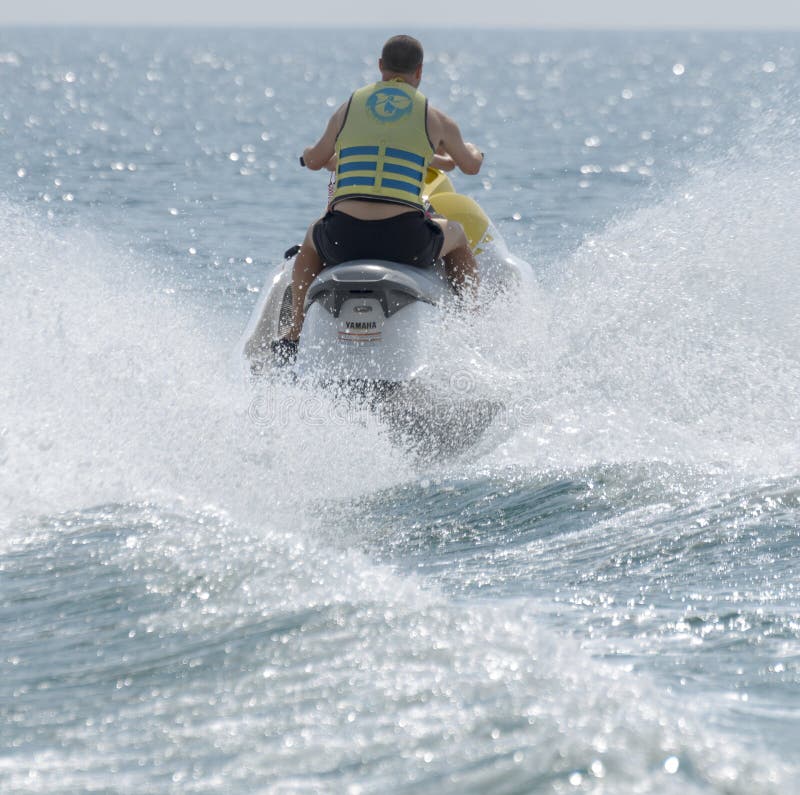 Jet ski fun on the sea editorial image. Image of thrills - 123707465