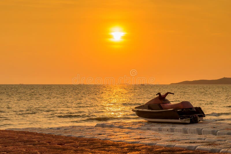 Jet Ski Parked on a Beach with Beautiful Landscape Sunset Stock Image ...