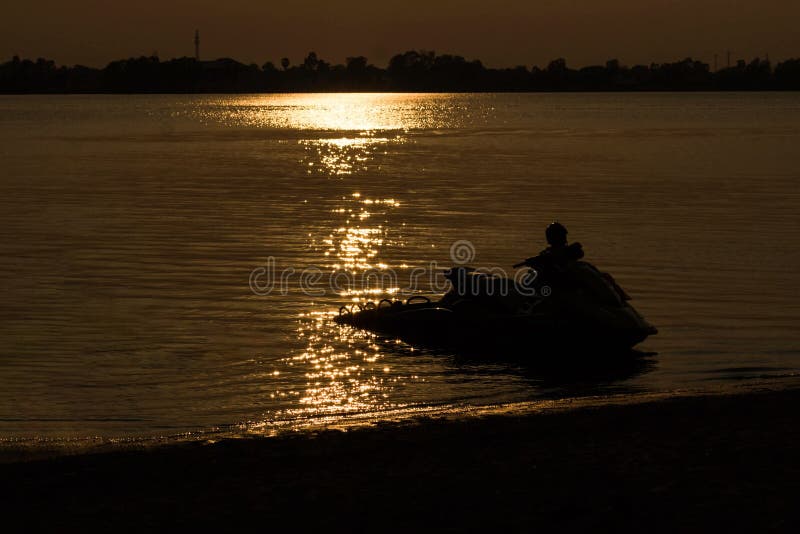 The Jet Ski with Sunset in Evening and the Lagoon in Thailand Stock ...
