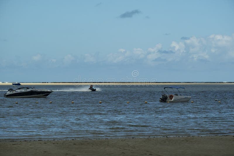 Jet Ski with Two People Sailing in Sea Water Stock Photo - Image of ...