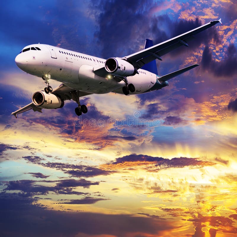 Jet in Flight at Sunset Time Stock Photo - Image of orange, panoramic ...