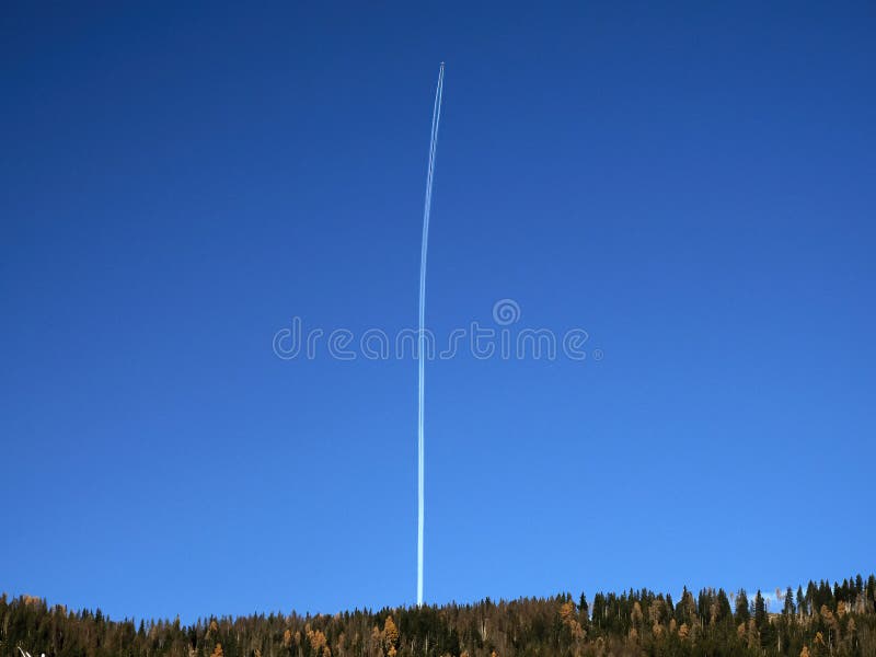 Jet Trail in the Blue Sky in Mountain Stock Image - Image of airplane ...
