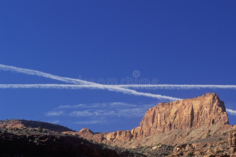 Jet Trails through a Western Sky Stock Image - Image of horizontal ...