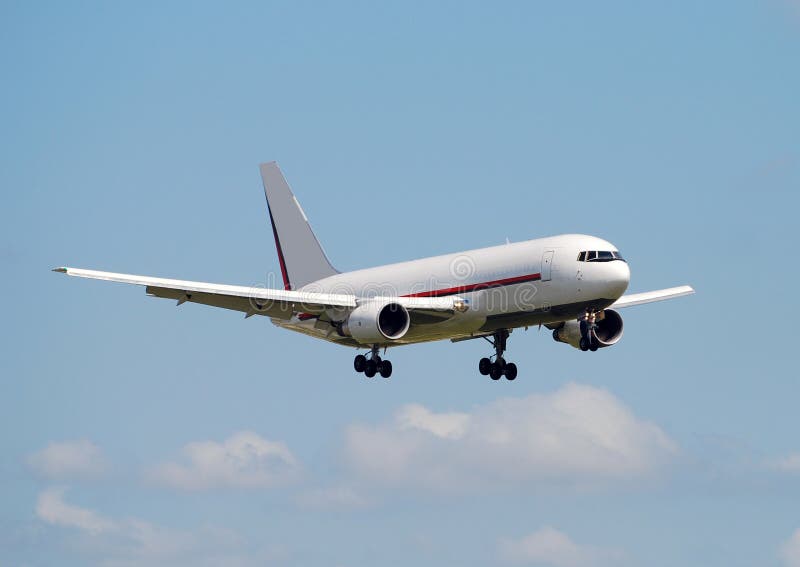 Jetliner in flight stock photo. Image of airborne, landing - 3936098