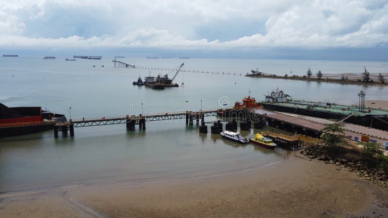 Jetty activities at Port stock photo. Image of port - 261699898