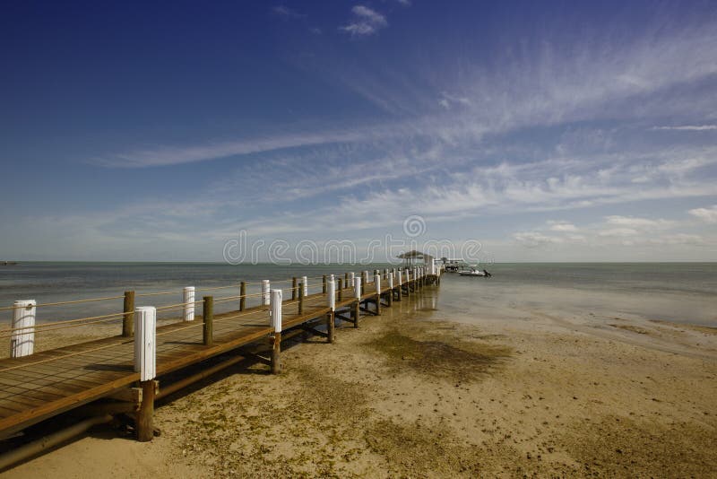 Jetty on the beach stock photo. Image of relaxation, calm - 25575320