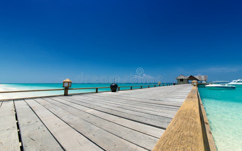 Jetty on the beach stock photo. Image of tropic, pier - 30702934