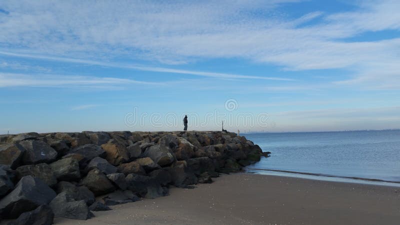 Jetty stock image. Image of alone, beach, jetty, blue - 66495943