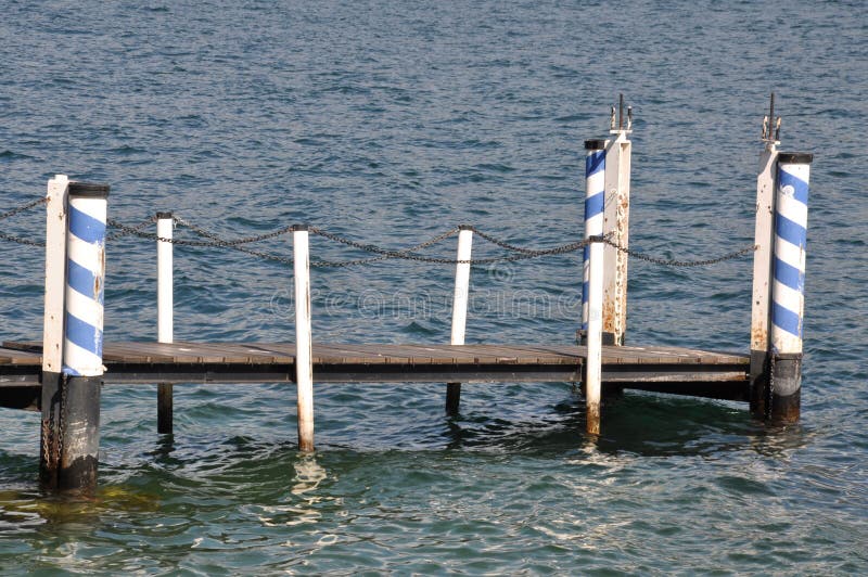 Jetty on lake Como stock image. Image of idyllic, bridge - 79716733