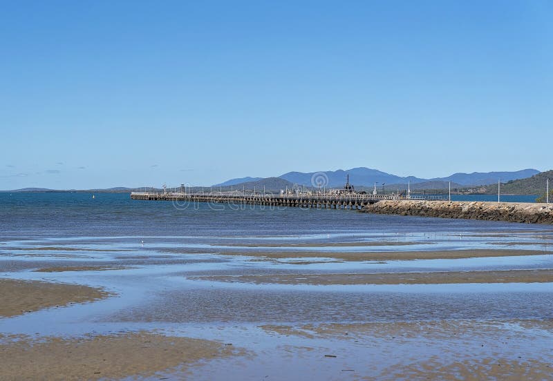 Jetty at low tide stock photo. Image of jetty, pier - 327144826