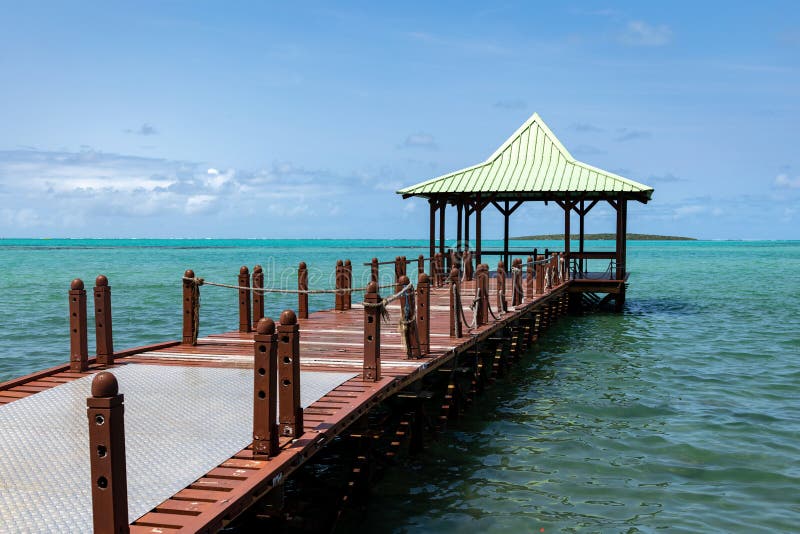 Jetty at Mahebourg harbour stock image. Image of sand - 336398855
