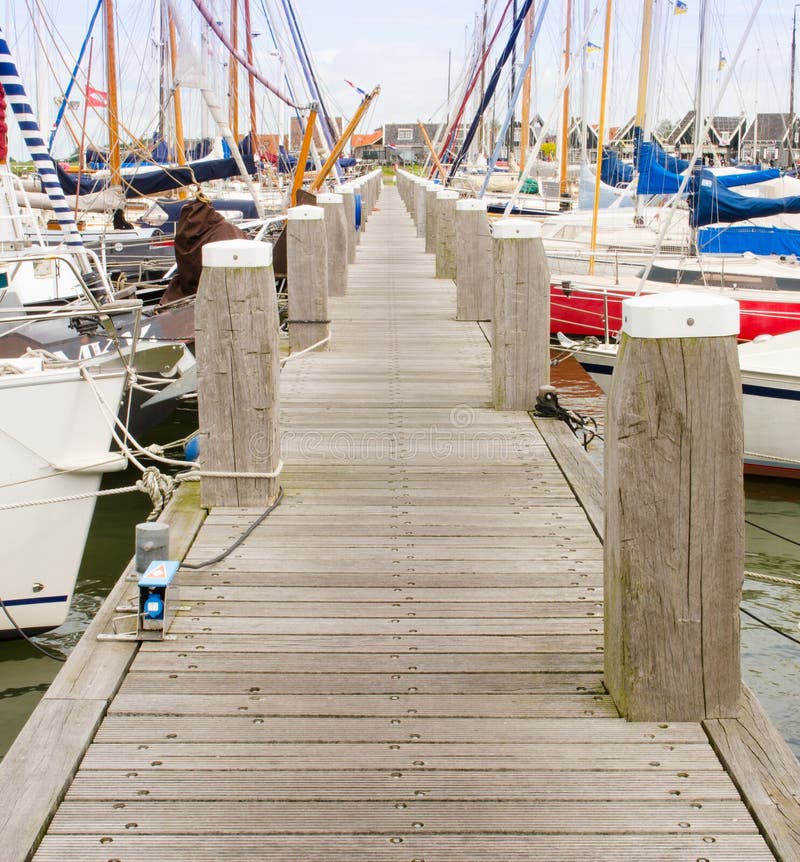 Jetty with sailingboats stock image. Image of recreation - 27922715