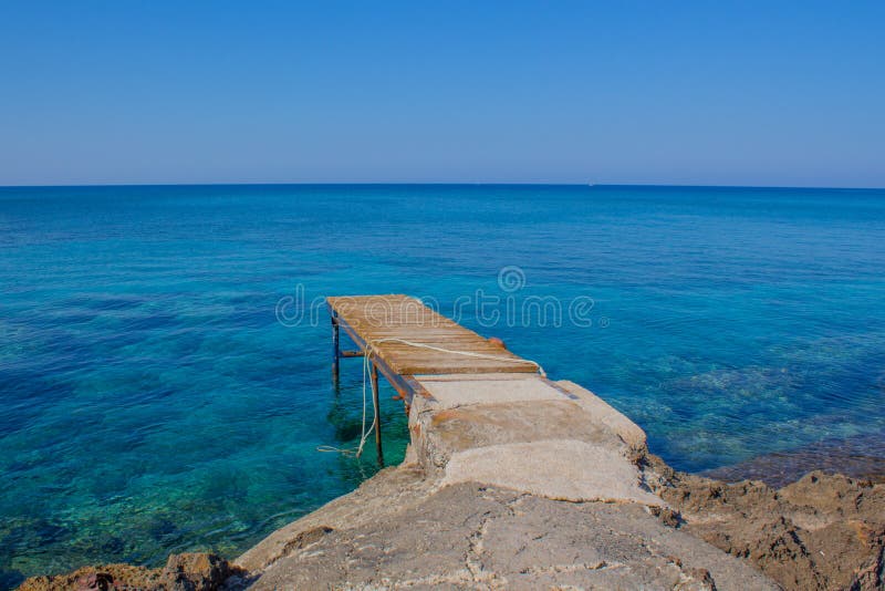 Jetty in the Sea stock photo. Image of sapphirine, tourist - 56948746