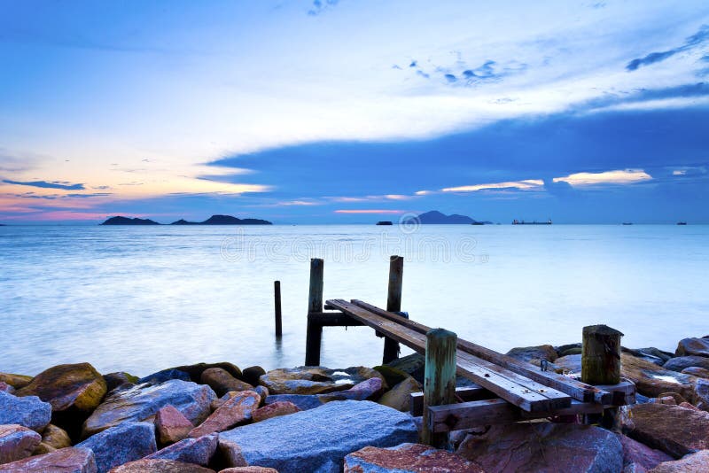Jetty on sea at sunset stock photo. Image of romantic - 31618502