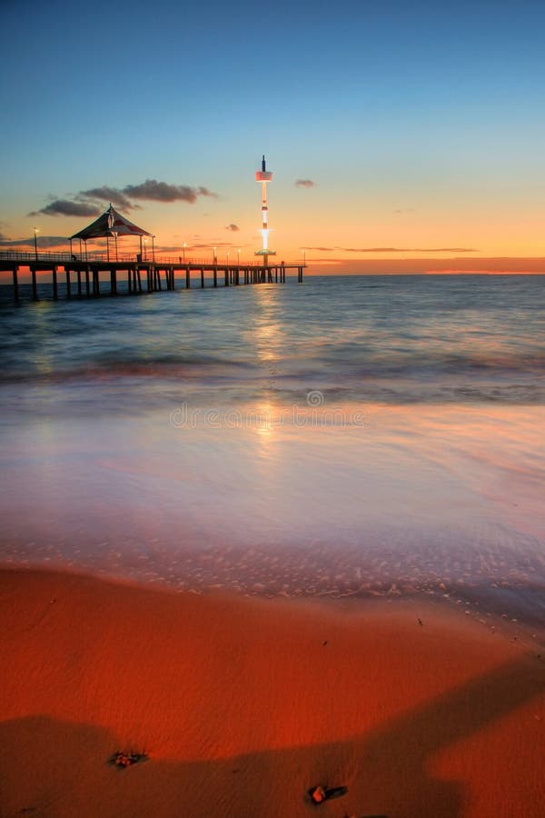 Jetty at Sunset with Beacon Stock Image - Image of pier, south: 14583815