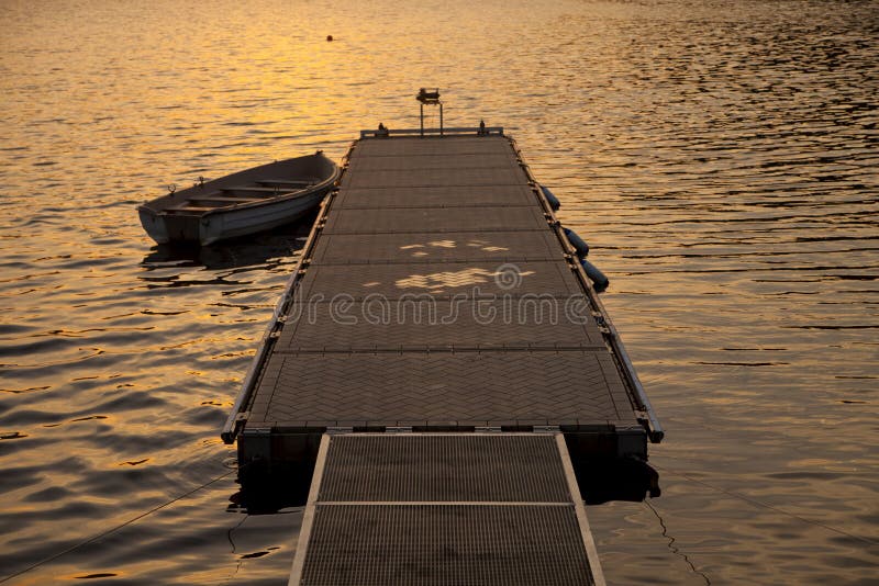 Jetty sunset boat stock photo. Image of england, mountainous - 25014586