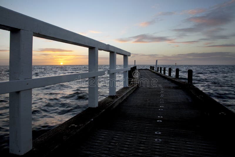Jetty at Sunset stock photo. Image of jetty, pier, walkway - 36147752