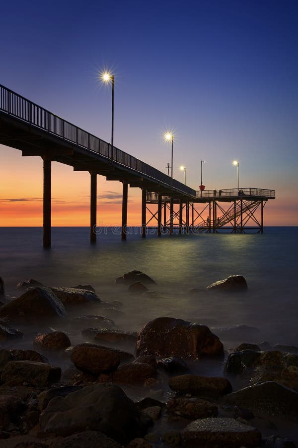 Jetty at sunset stock image. Image of bridge, background - 189888221