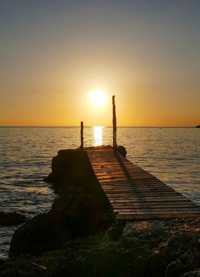 Jetty at sunset stock image. Image of holiday, outdoor - 79285523