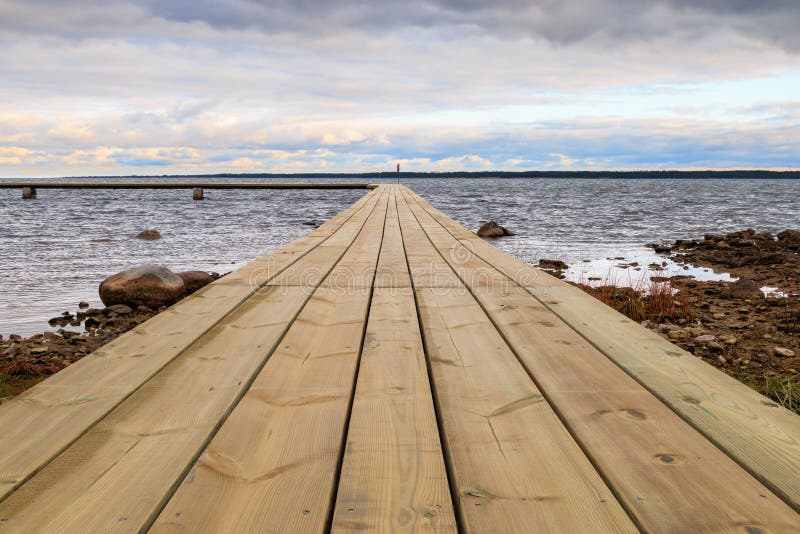 Jetty by the water stock photo. Image of dull, horizon - 45935714