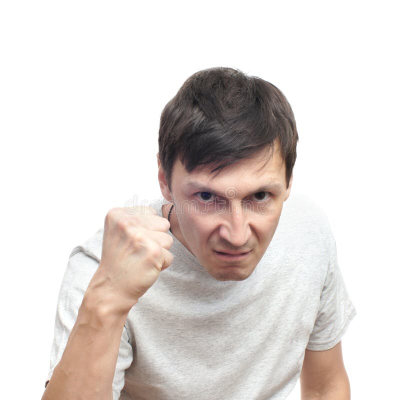 Jeune homme malveillant image stock. Image du fond, combat - 21849445