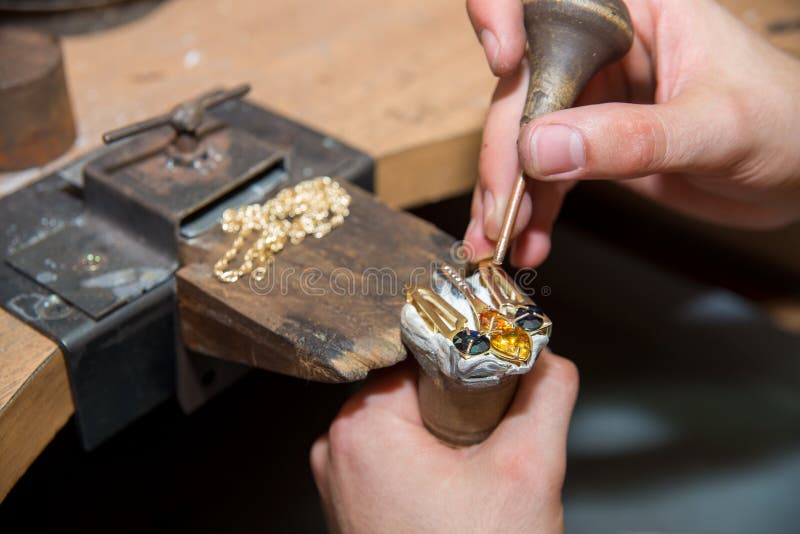 Goldsmith and diamond ring stock photo. Image of eastern - 4569486