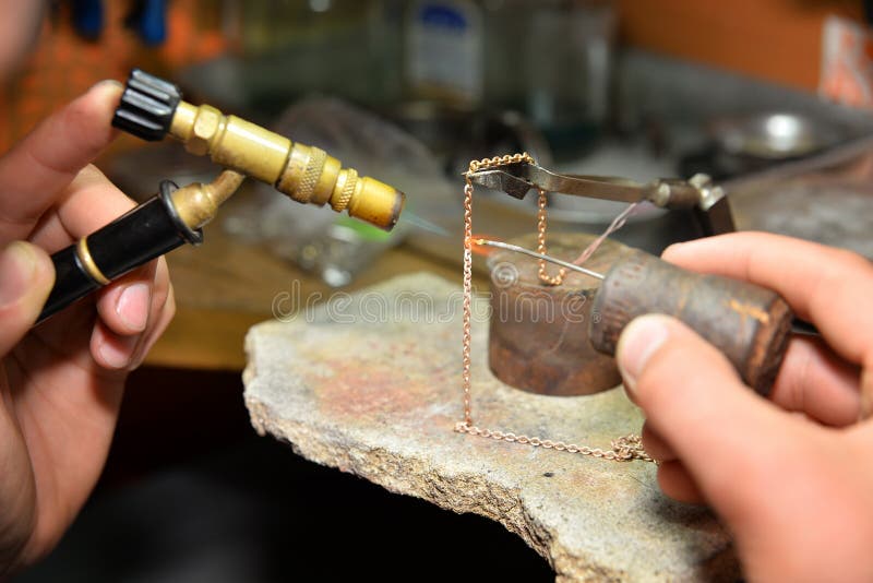 Jeweler hands at work stock image. Image of bracelet - 75150689