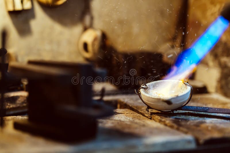 Jeweler welding gold stock image. Image of gold, melt - 133762209