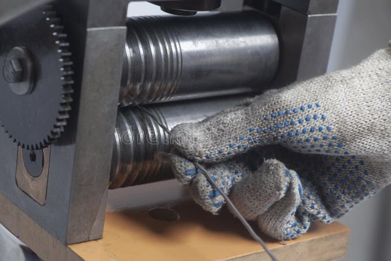 Jeweler at Work, Process Rolling of a Silver Wire Stock Image - Image ...