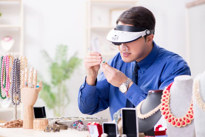 The Jeweler Working with Luxury Jewelry in the Workshop Stock Photo ...