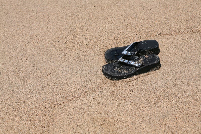 Jewelled Dirty Sandals in the Sand Stock Photo - Image of brown, barren ...