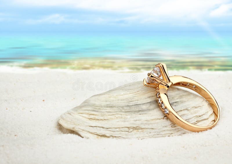 Jewellry Ring with Big Diamond on Sand Beach with Copy Space, so Stock ...