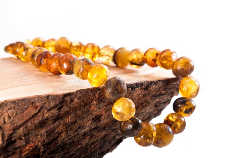 Jewelry Made of Amber on a White Background Stock Photo - Image of ...