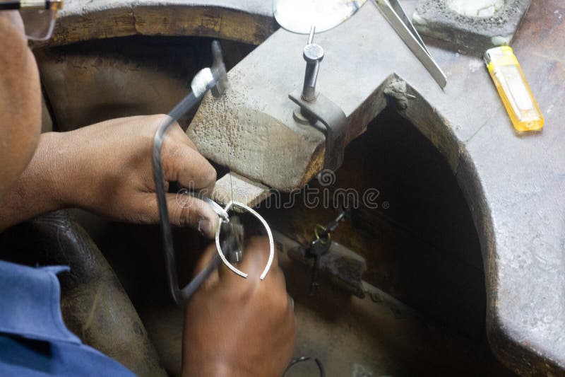 Jewelry Making. Gold/Silver Jewelry or Ring with Tools in Background ...