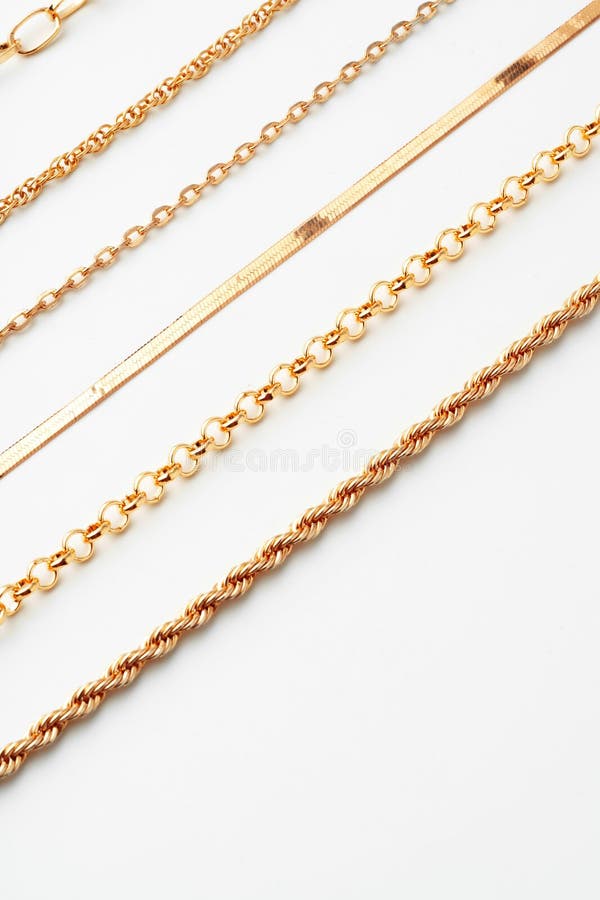 Jewelry Set of Golden Chains on the White Background Stock Photo ...