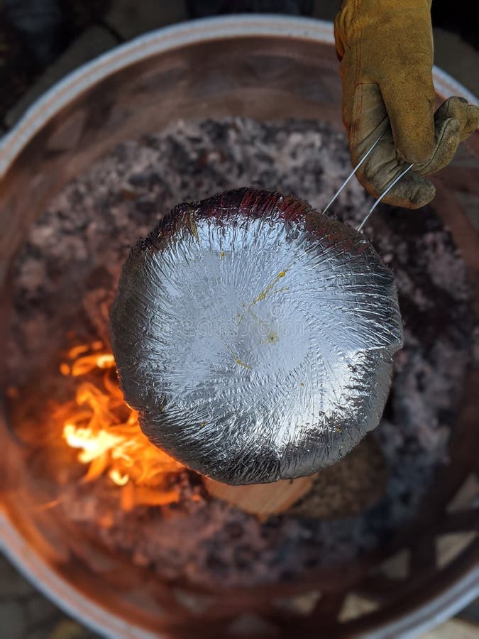 Jiffy Pop over a fire stock image. Image of yellow, yard - 316030973