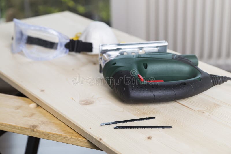 Jig saw on work bench stock image. Image of working, industry - 96444187