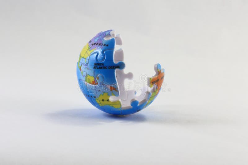 Jigsaw earth on hand stock image. Image of hand, assembled - 2649799