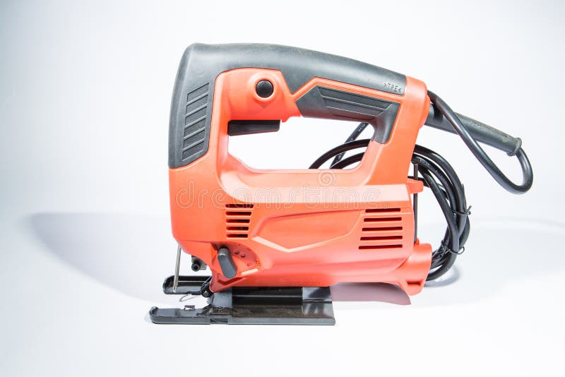 Jigsaw electrical stock photo. Image of hand, holding - 39274918