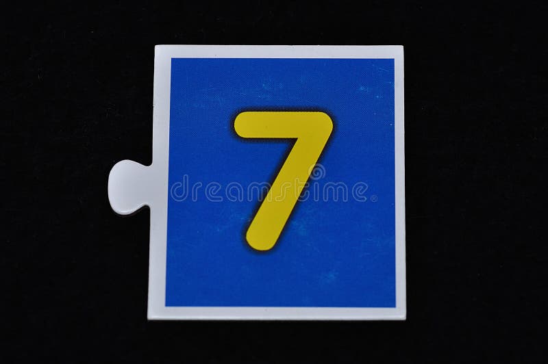A Jigsaw Piece with the Figure Seven Stock Image - Image of figure ...