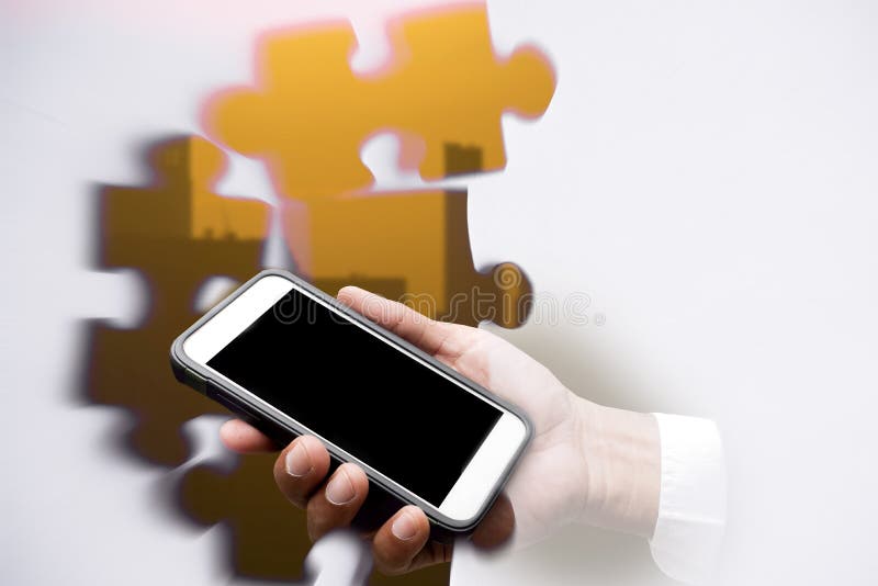 Jigsaw Puzzle Double Exposure with Hand Hold Mobile Phone Stock Photo ...